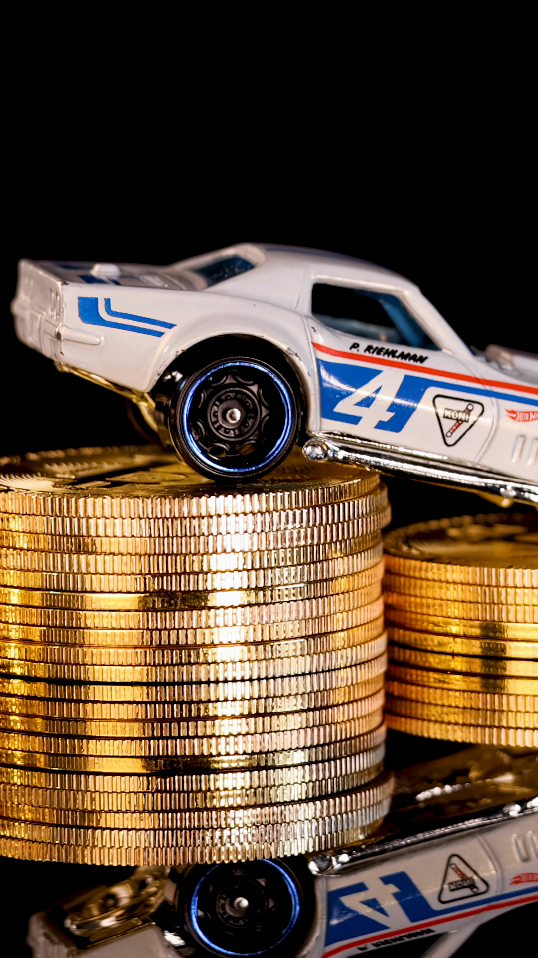 Toy Race Car Rotates On Stacked Gold Coins Stock Footage SBV-353154262 ...