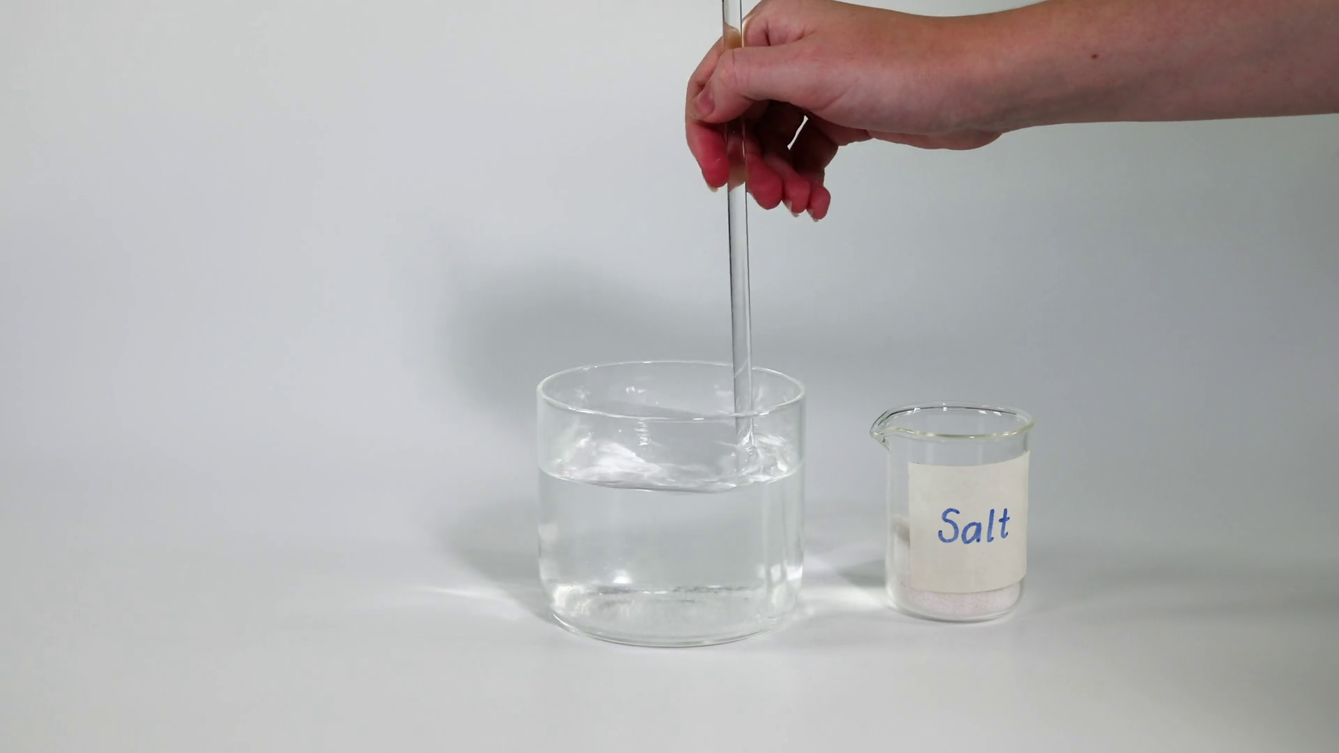 Demonstration Of Salt Dissolving In Water Stock Footage SBV-353007274 ...