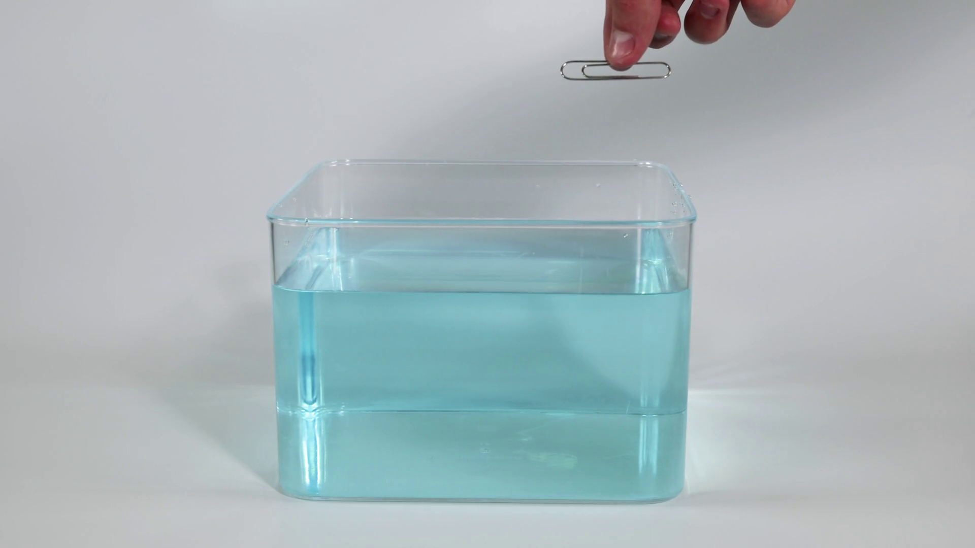 Paper Clip Dropped Into Water Tank Stock Footage SBV-352405420 ...