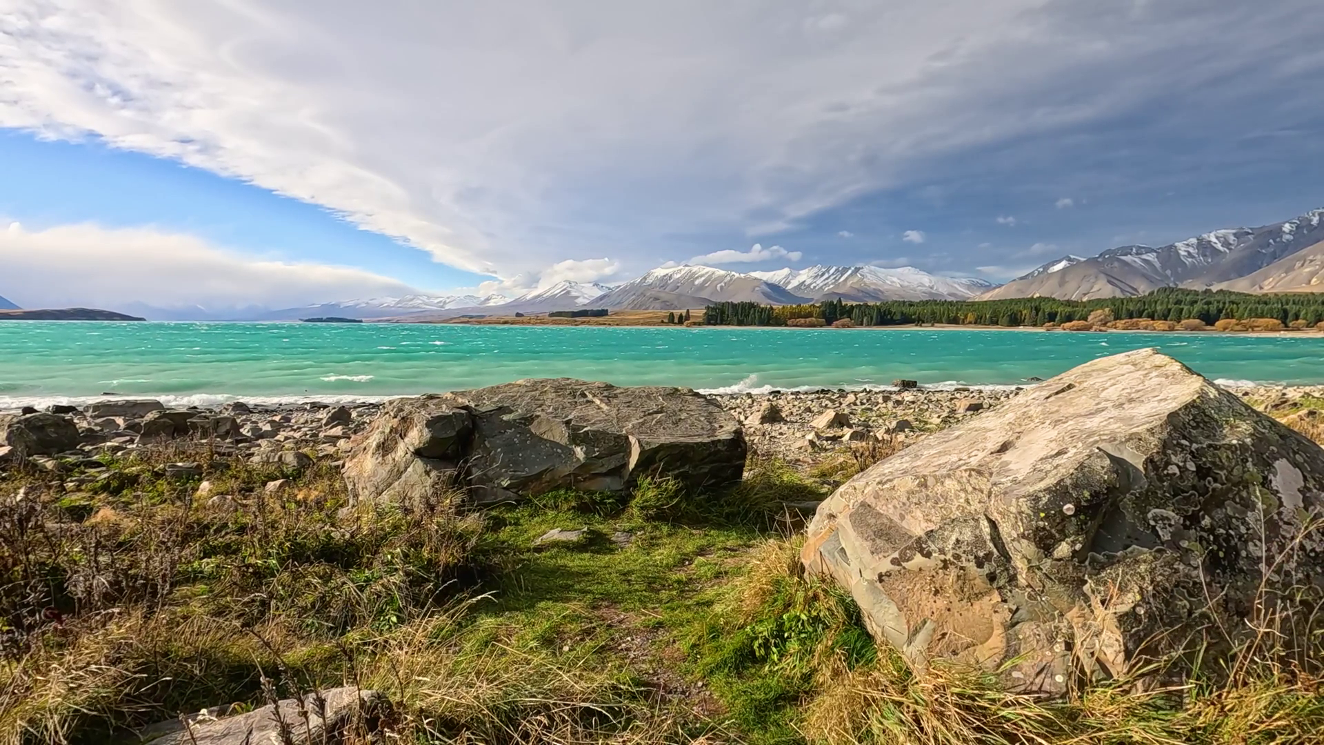 Windy Lake Shore With Rocky Foreground Stock Footage SBV-352571357 ...