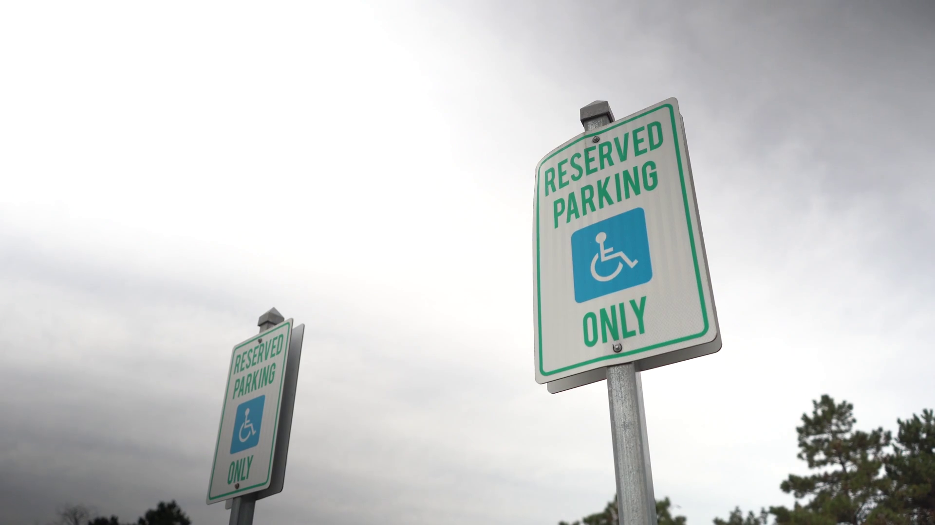 Handicapped Parking Signs On Cloudy Day Stock Footage SBV-347568218 ...