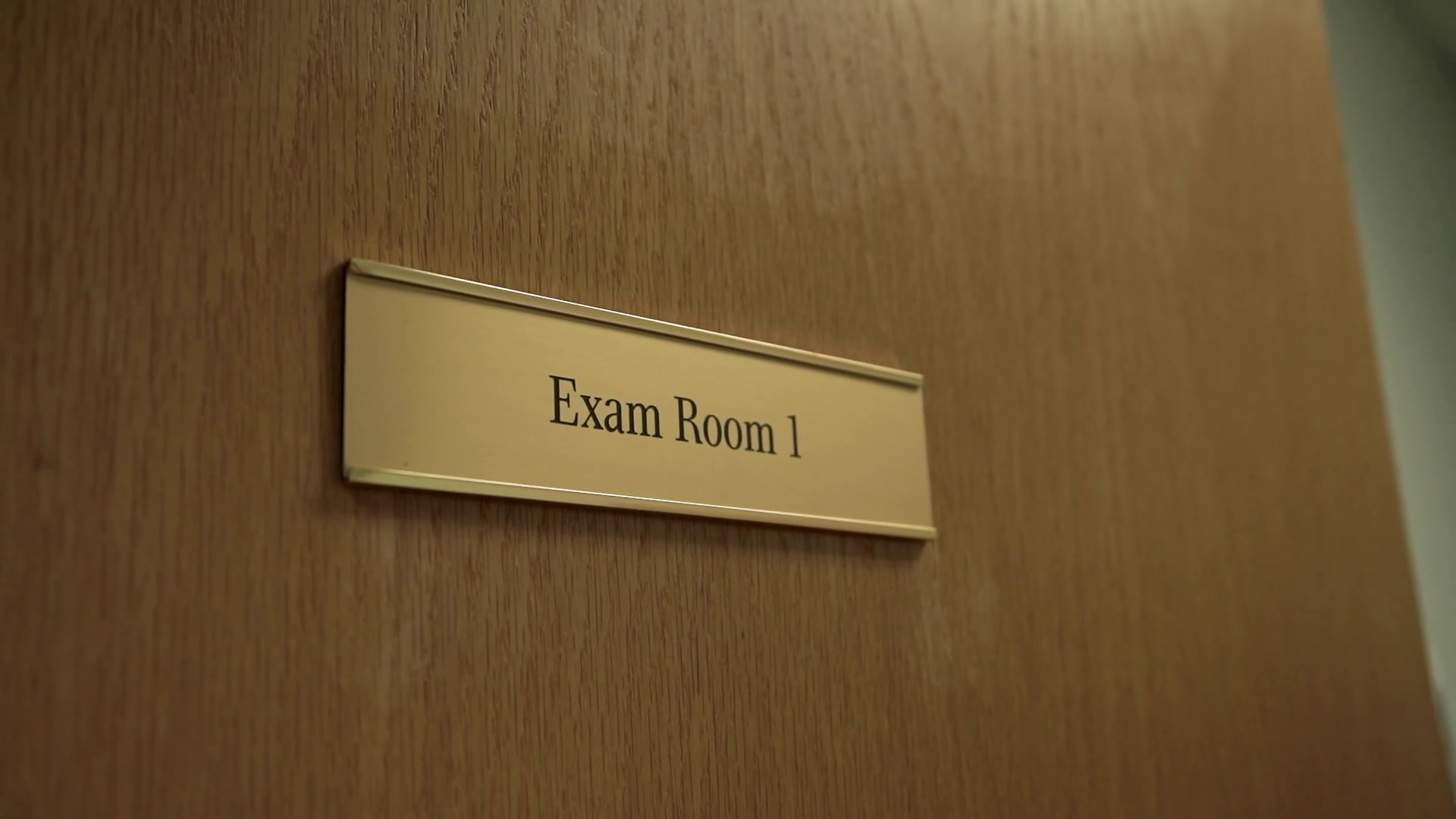 Exam Room 1 Sign At Healthcare Clinic Stock Footage SBV-351868689 ...