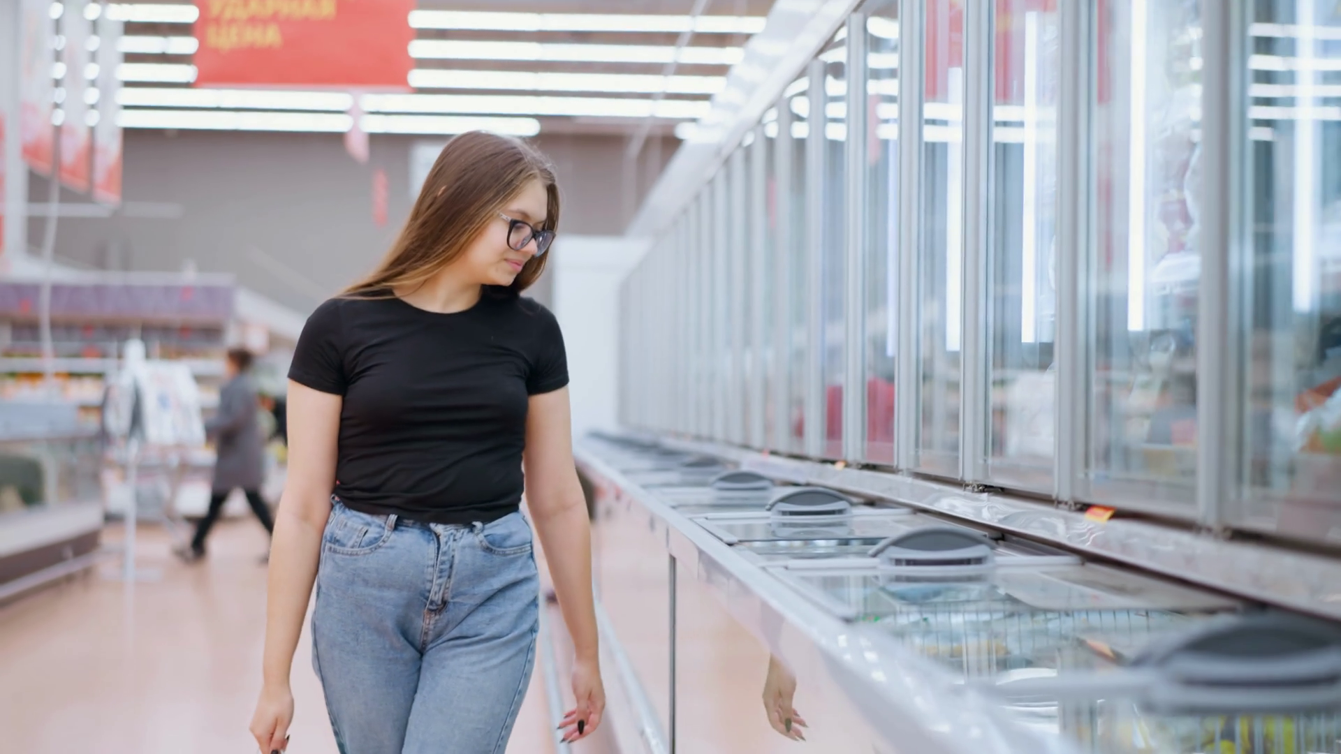 Young Lady Standing In Front Of Display At Stock Footage SBV-351857605 ...