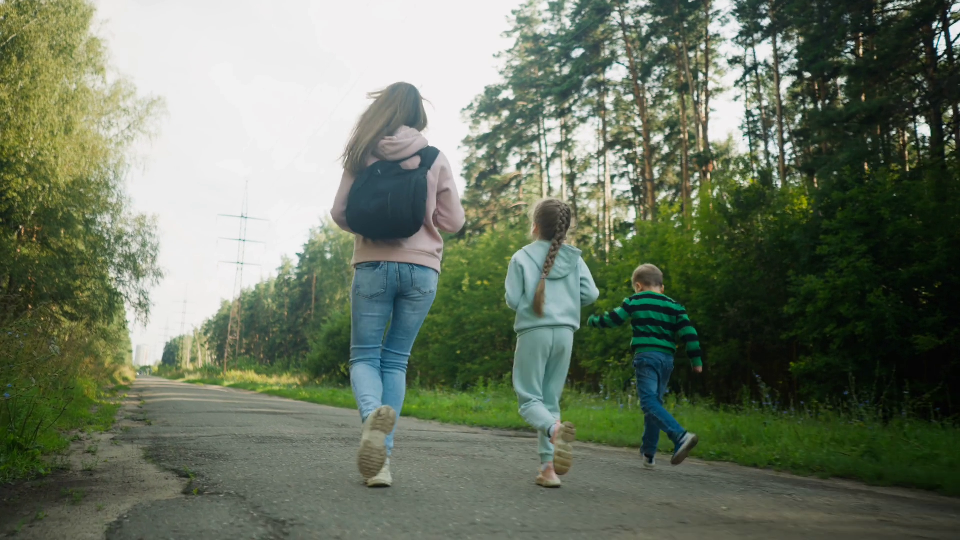 Rear View Of Young Siblings Joyfully Running Stock Footage SBV ...