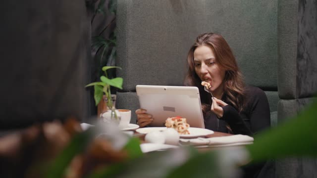 Eating Tablet Stock Footage: Royalty-Free Video Clips - Storyblocks