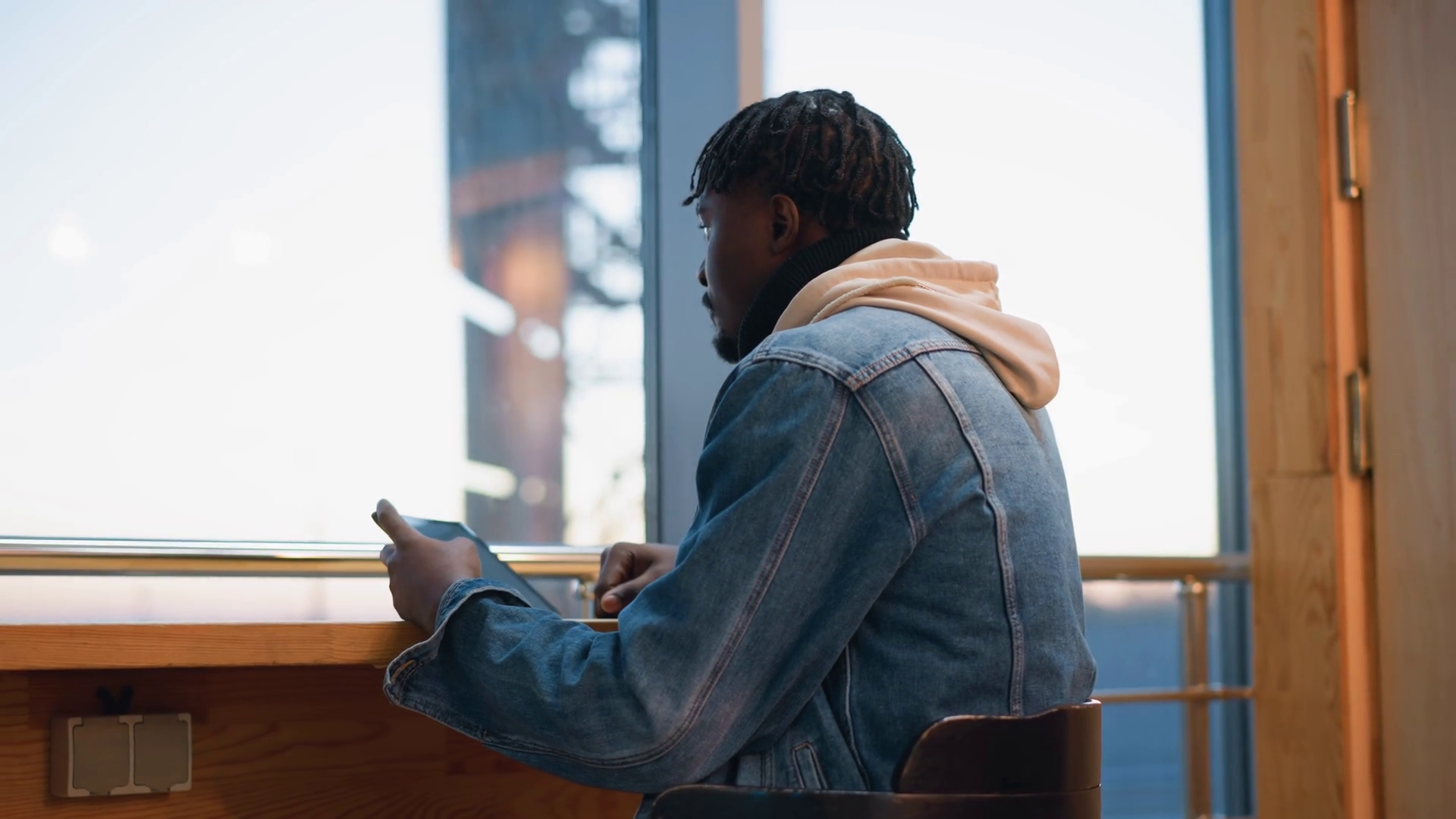 Young Black Chap Seated At Wooden Counter Stock Footage SBV-352421564 ...