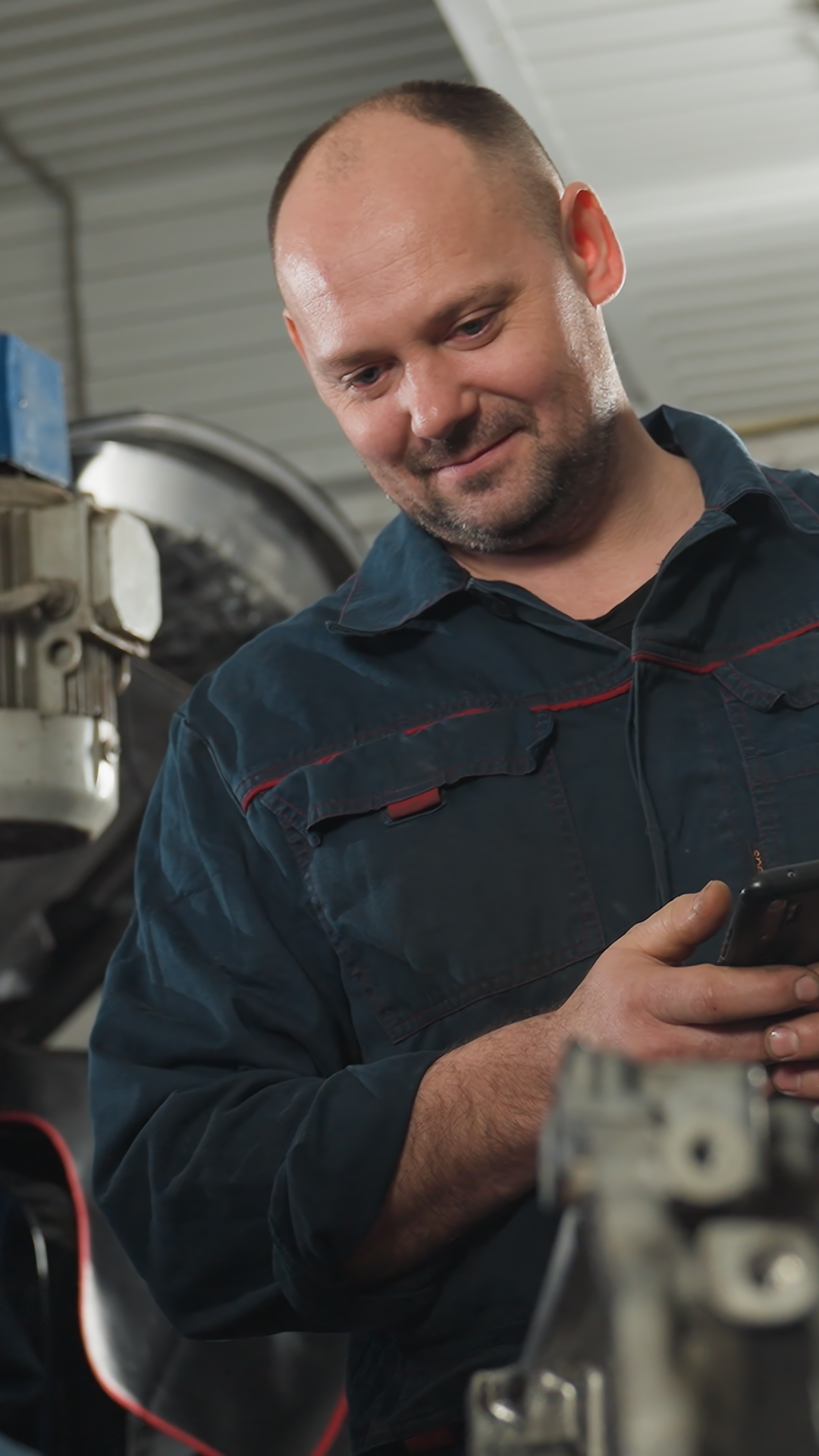Man In Blue Uniform In Automotive Workshop Stock Footage SBV-353373743 ...