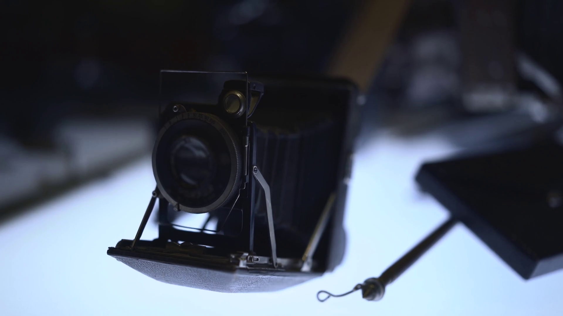 Old Movie Camera Stand On Highlighted Table Stock Footage SBV-347345115 ...