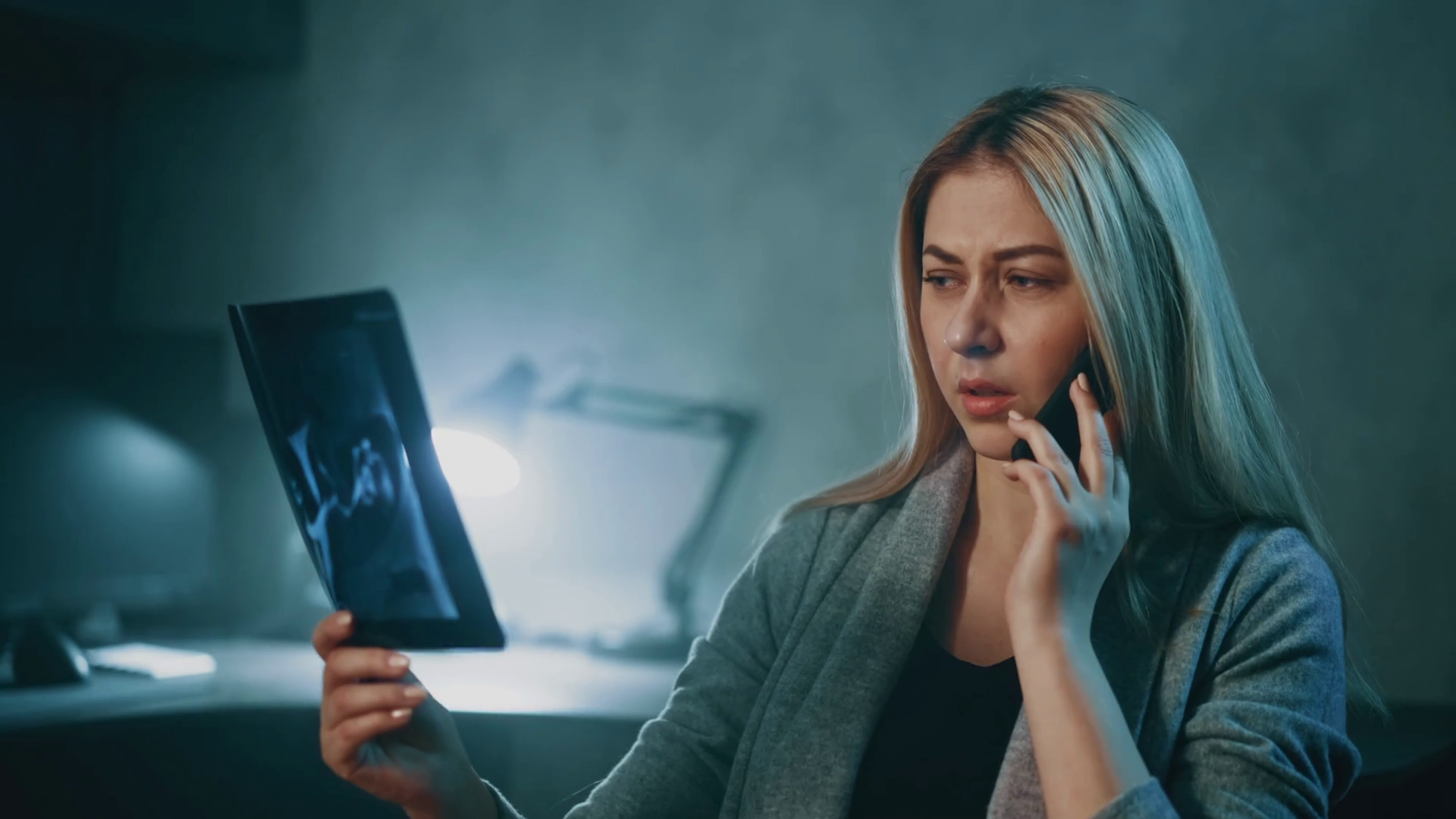 Confused Blonde Woman Doctor Examines X-ray Stock Footage SBV-347398594 ...