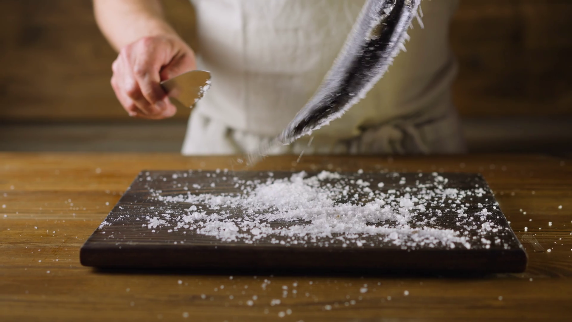 Male Chef Shakes Salt Out Off Delicious Fat Stock Footage SBV-347444296 ...