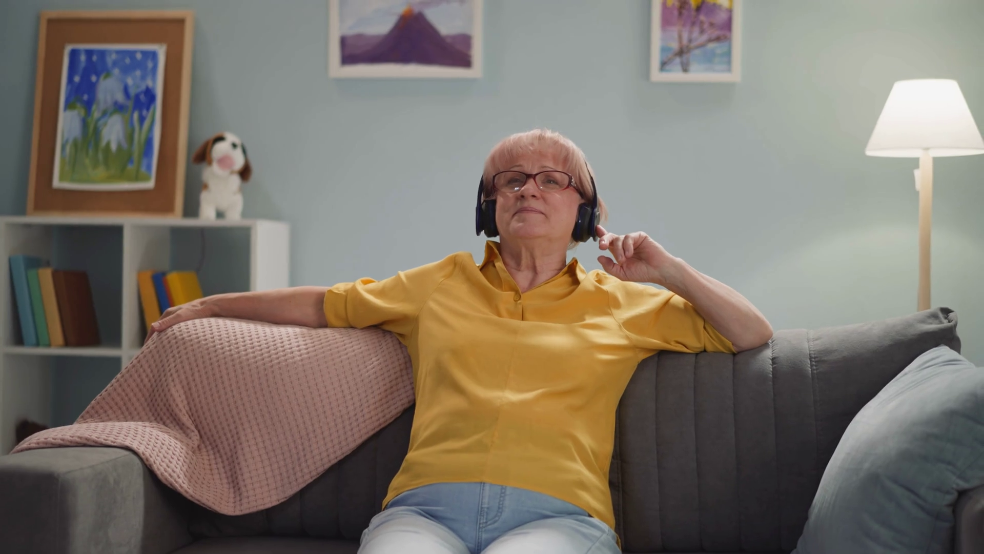Modern Grandmother Is Sitting On Couch Stock Footage SBV-347384979 ...