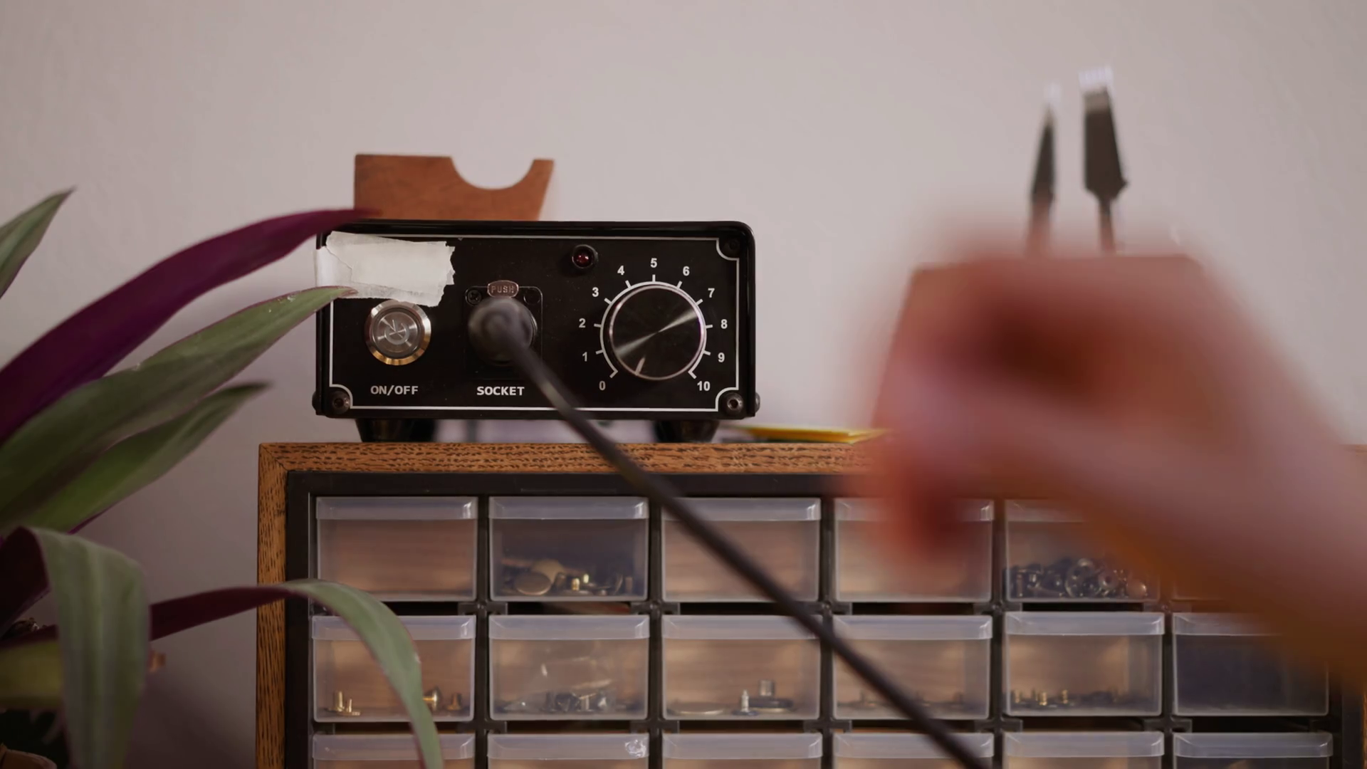 Man Turns On Tunes Electrical Leather Edger Stock Footage SBV-347353807 ...