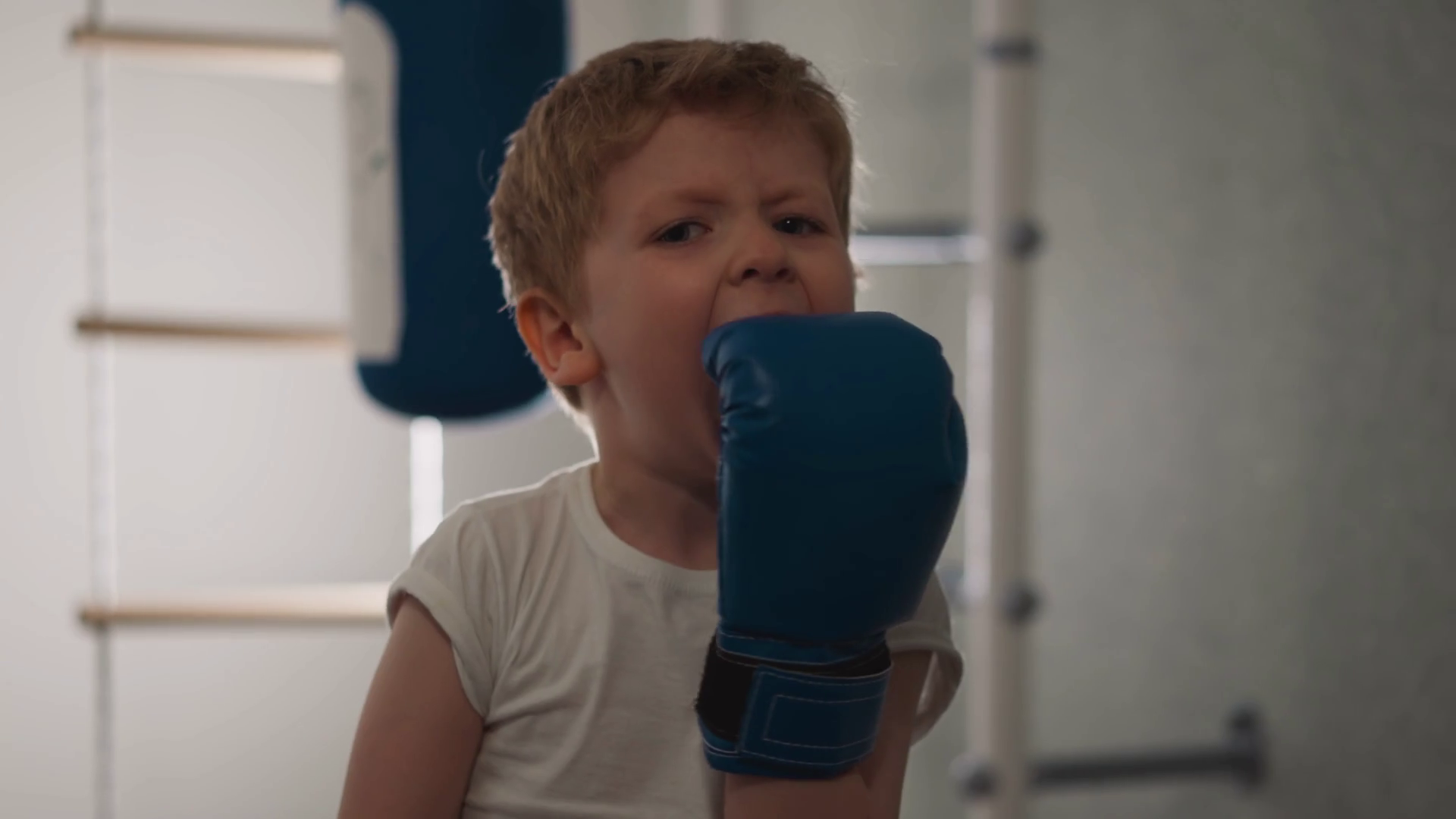 Toddler Boy Takes Off Boxer Glove Looks Stock Footage SBV-347711179 ...
