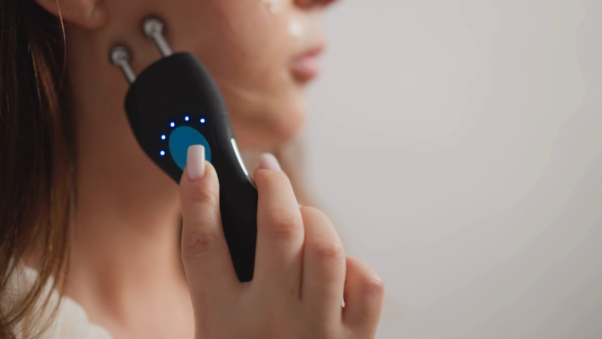 Woman Uses Microcurrent Device With Healing Stock Footage SBV-348566940 ...