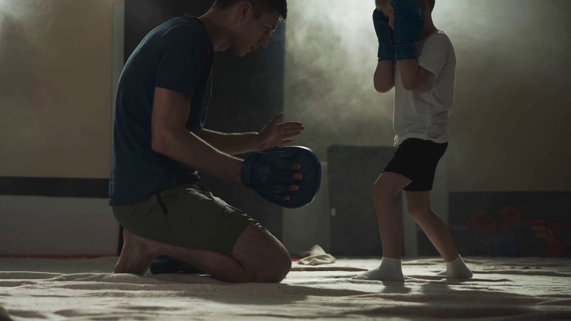Child Kicking Pad Held Coach In Gym Stock Footage SBV-348690664 ...