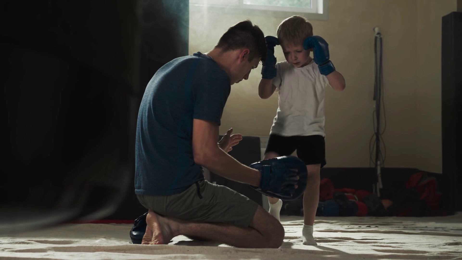 Child Kicking Pad Held Coach In Gym Stock Footage SBV-348690670 ...