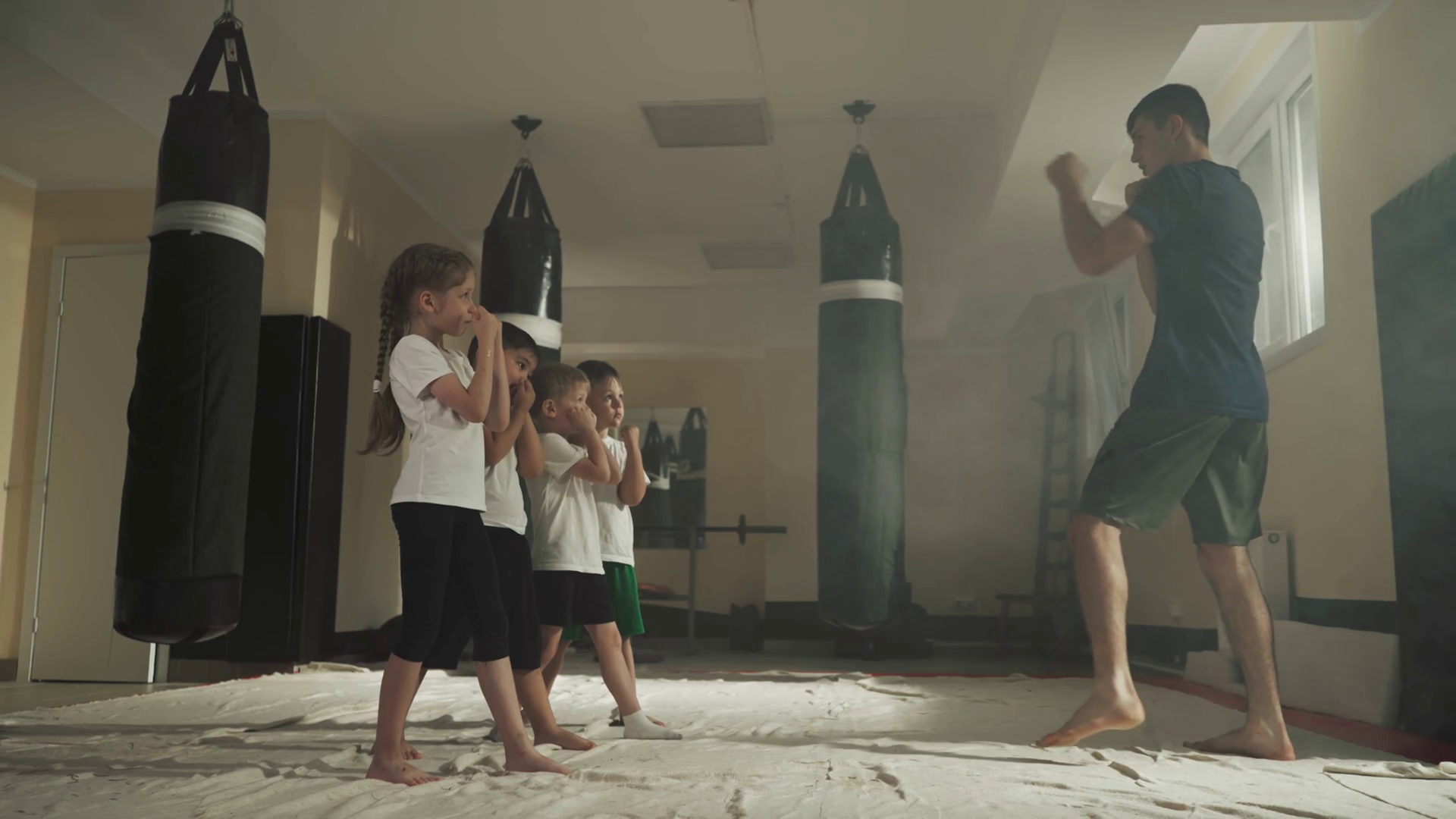 Children Do Punches With Trainer In Fighting Stock Footage SBV ...