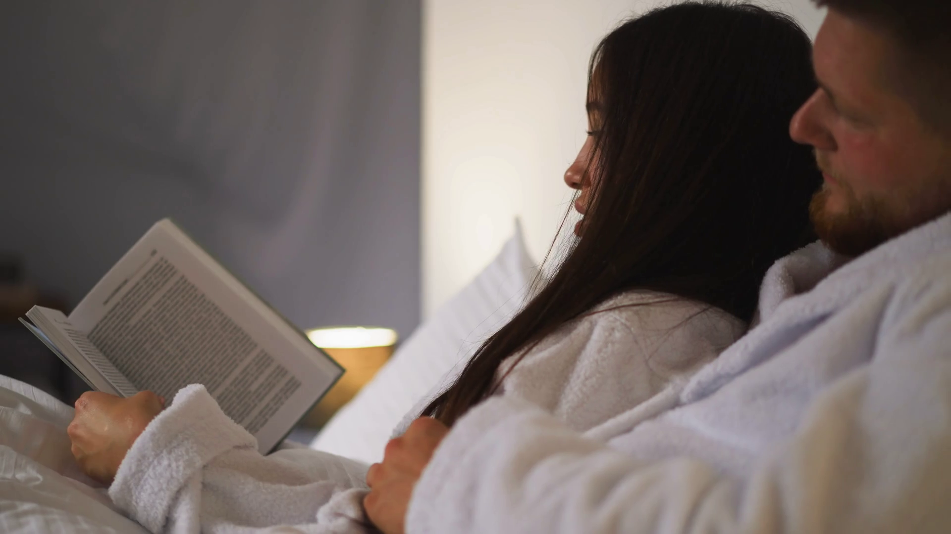 Newlyweds Couple Holds Hands Reading Book In Stock Footage SBV ...