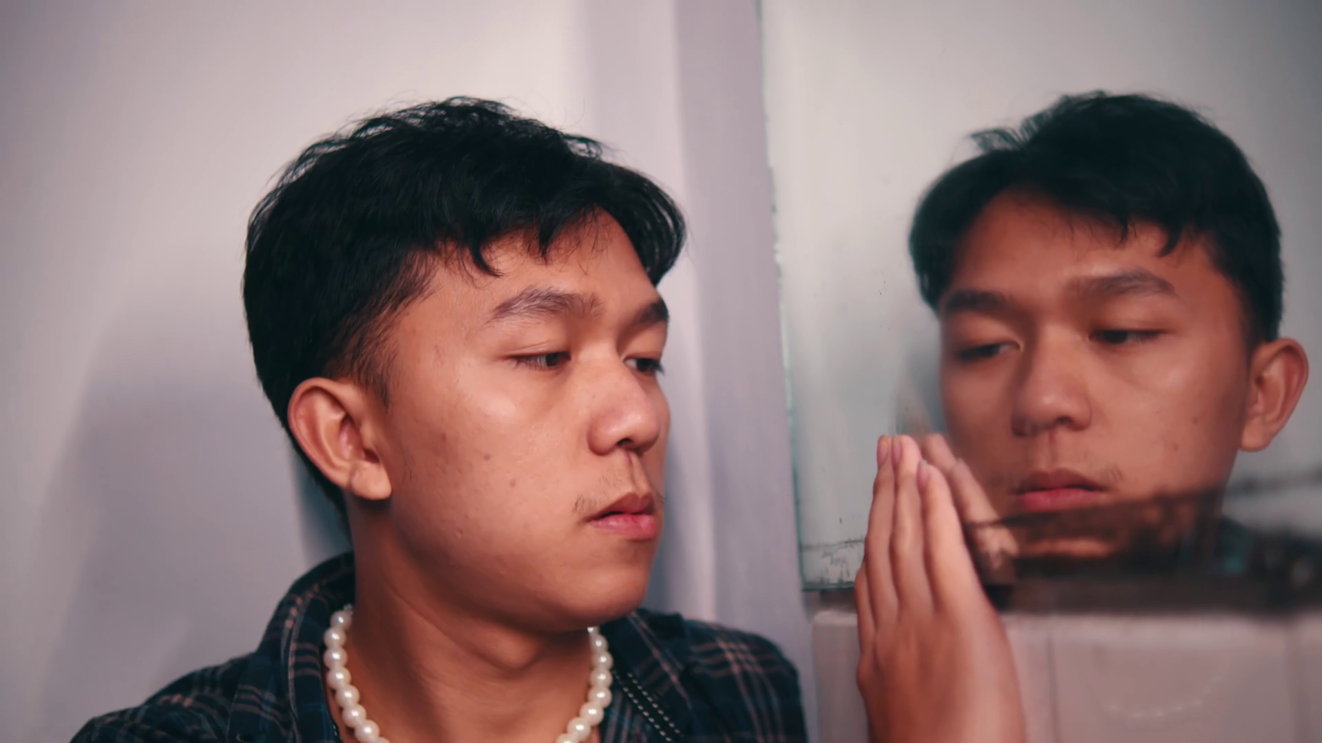 An Asian Man Is Looking At Holding Mirror In Stock Footage SBV ...