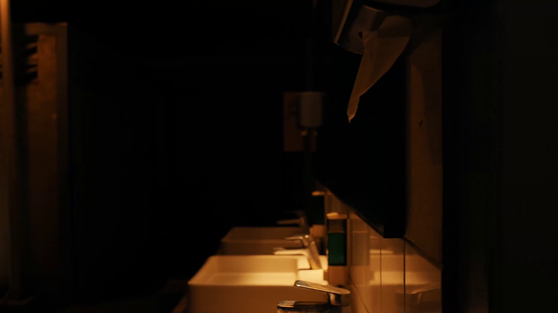 Person Washing Hands In Dimly Lit Bathroom Stock Footage SBV-348808577 ...