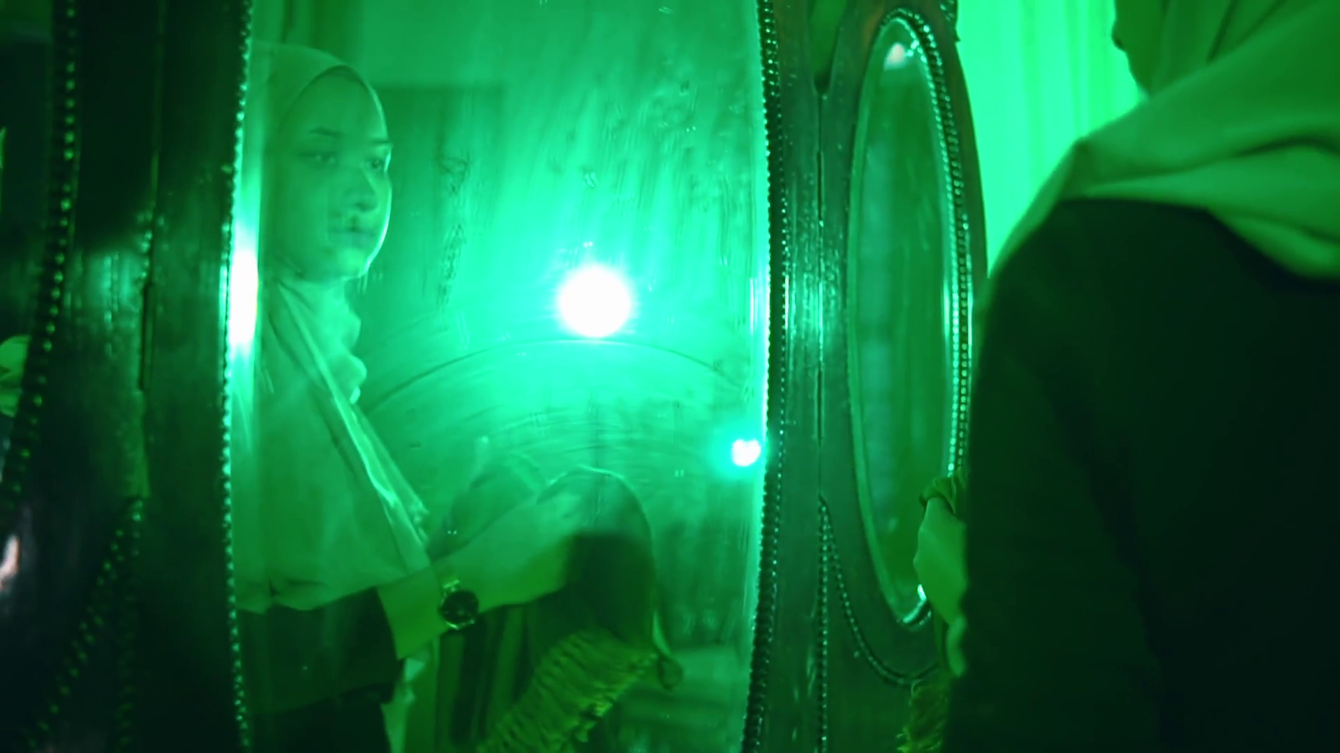 A Muslim Woman Takes Holds Mysterious Green Stock Footage SBV-347766442 ...