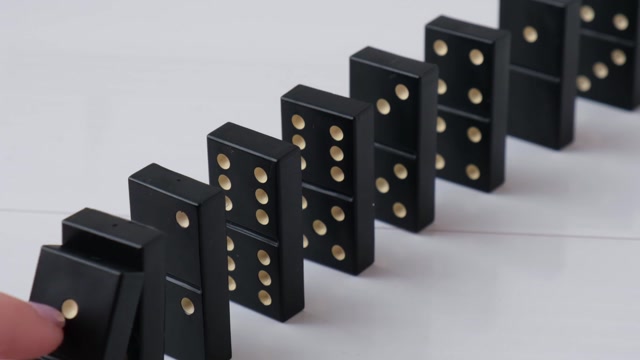 Dominoes Falling Stock Footage: Royalty-Free Video Clips - Storyblocks