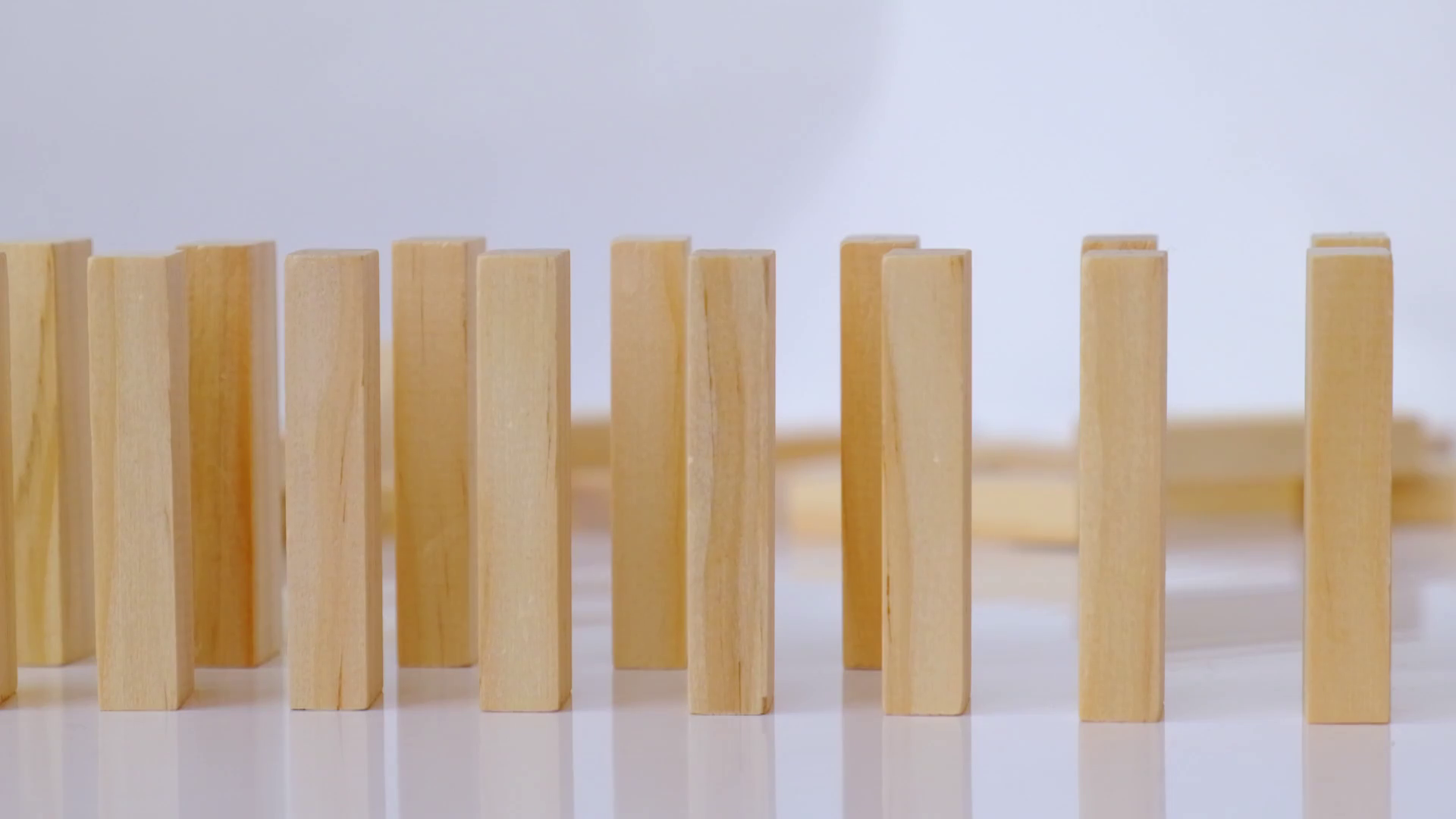 Domino Effect Row Of Wooden Dominos Falling Stock Footage SBV-348537215 ...