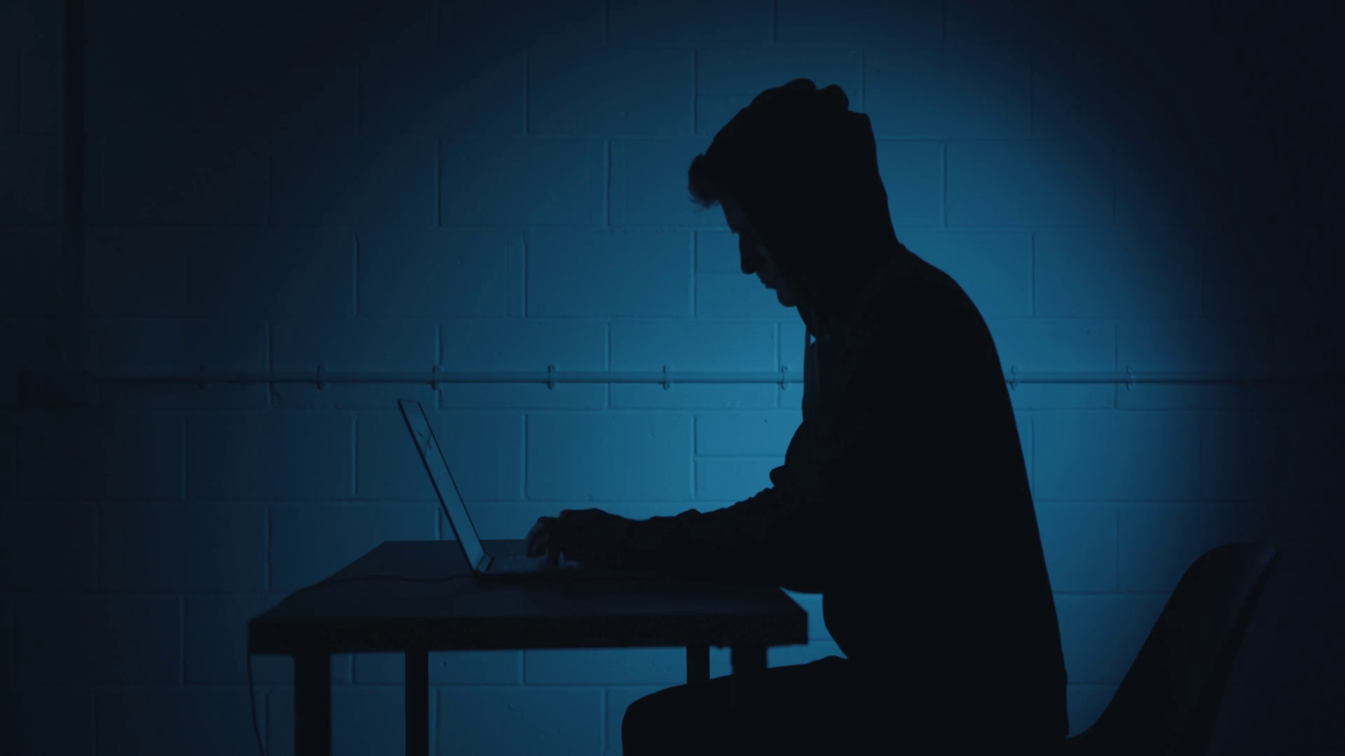Silhouette Of Man Using Laptop In Dark Room Stock Footage SBV-352061485 ...