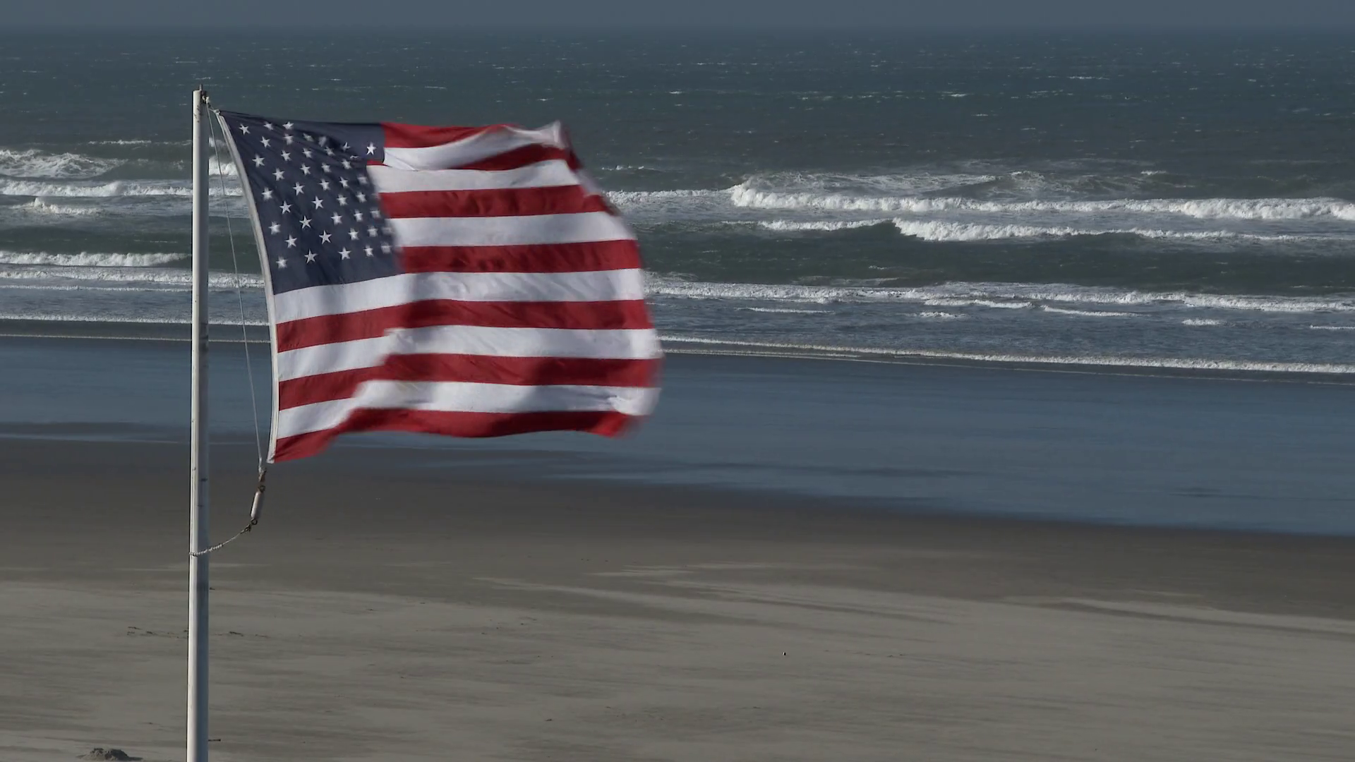 High Winds Blowing American Flag At Beach Stock Footage SBV-327496665 ...