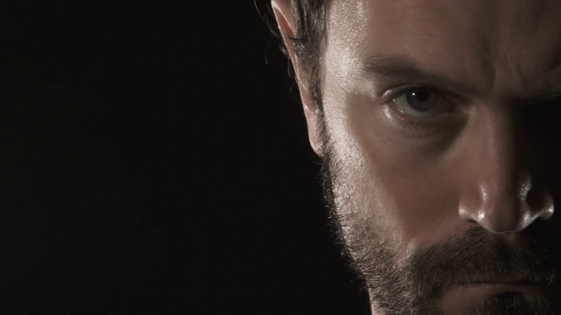 Man Stares Down Against Black Blackground Stock Footage SBV-329607006 ...