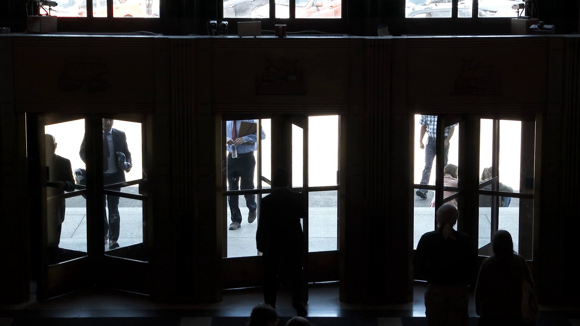 People Walking Through Revolving Doors Stock Footage SBV-335239128 ...