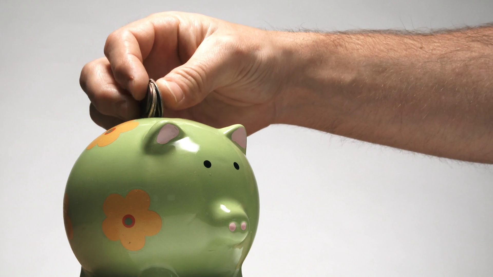 Person Adding Money To Their Piggy Bank 2 Stock Video Footage - Storyblocks