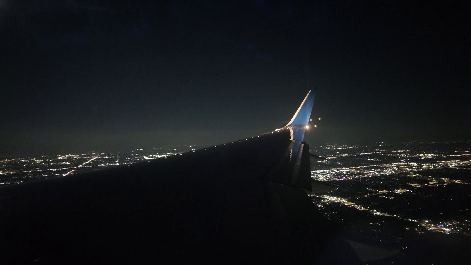 View Of Airplane Wing Flying Over City At Stock Footage SBV-352957598 ...