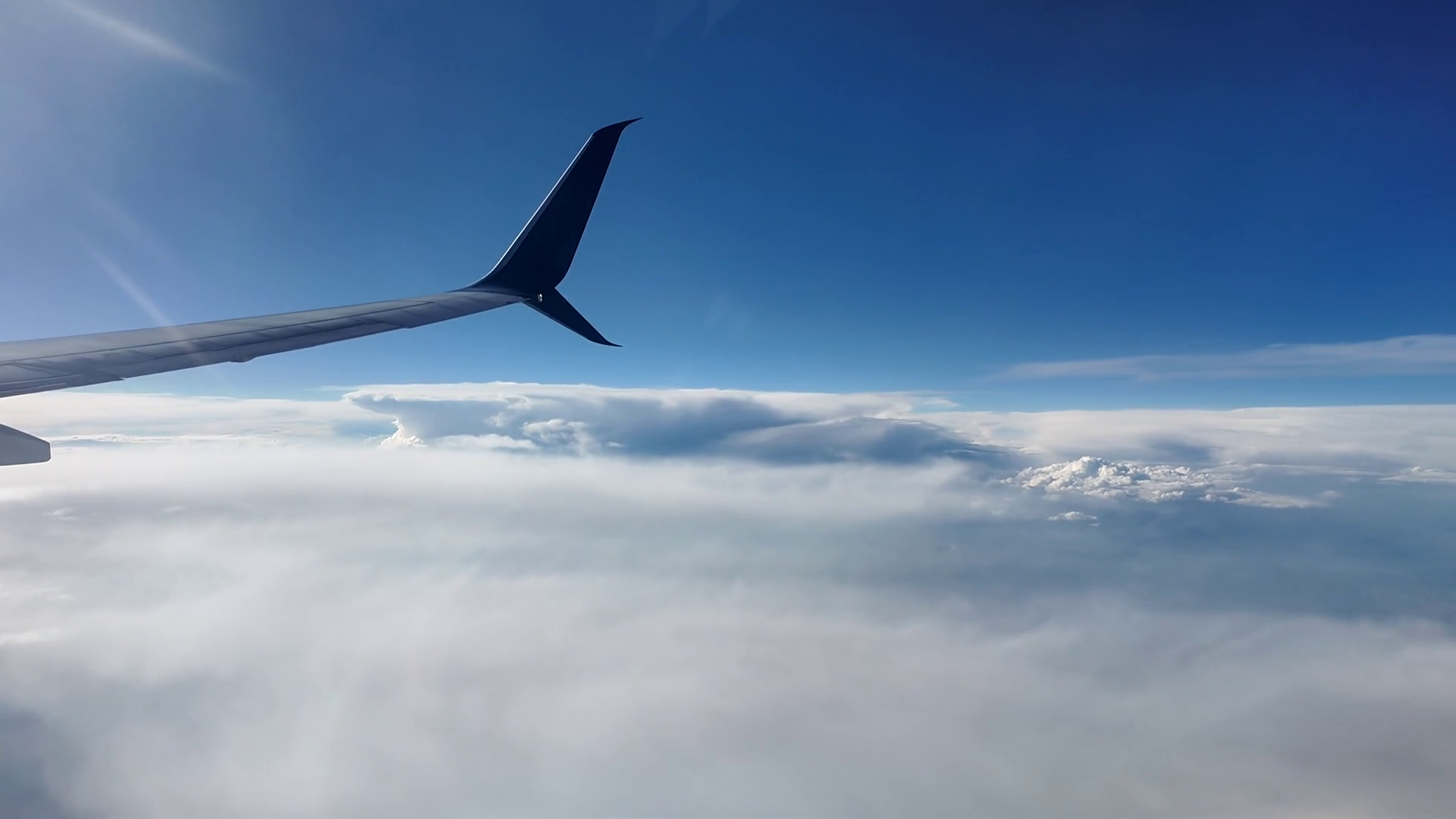 Zooming Past Airplane Wing Revealing Clouds Stock Footage SBV-351861374 ...