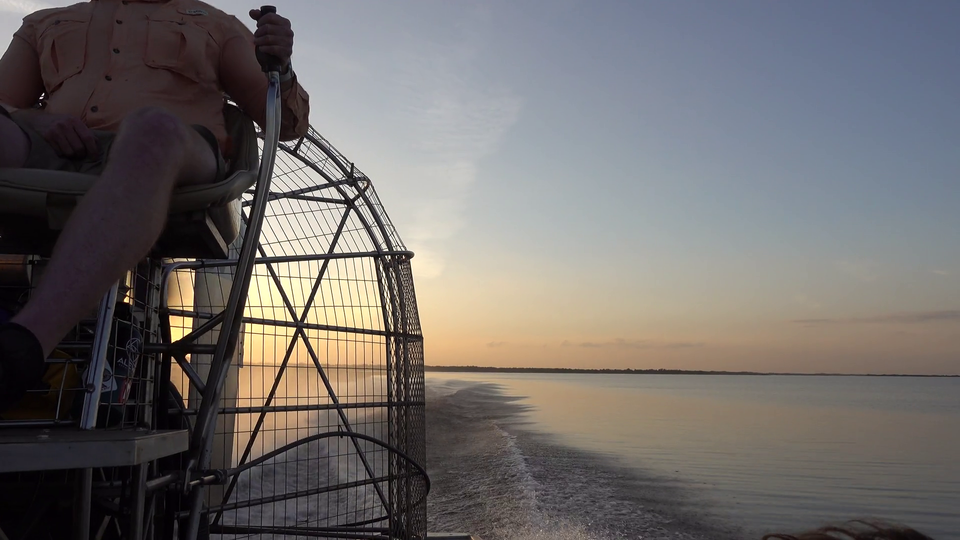 At Sunset Airboat Operator Pilots Airboat Stock Footage SBV-347646400 ...