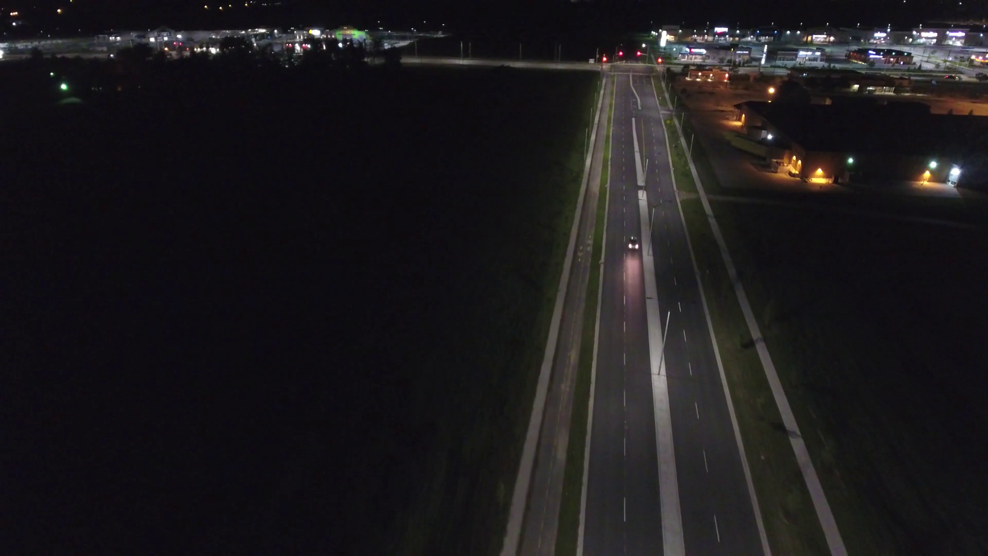 Car Driving Down Empty Road At Night From Stock Footage SBV-348412849 ...
