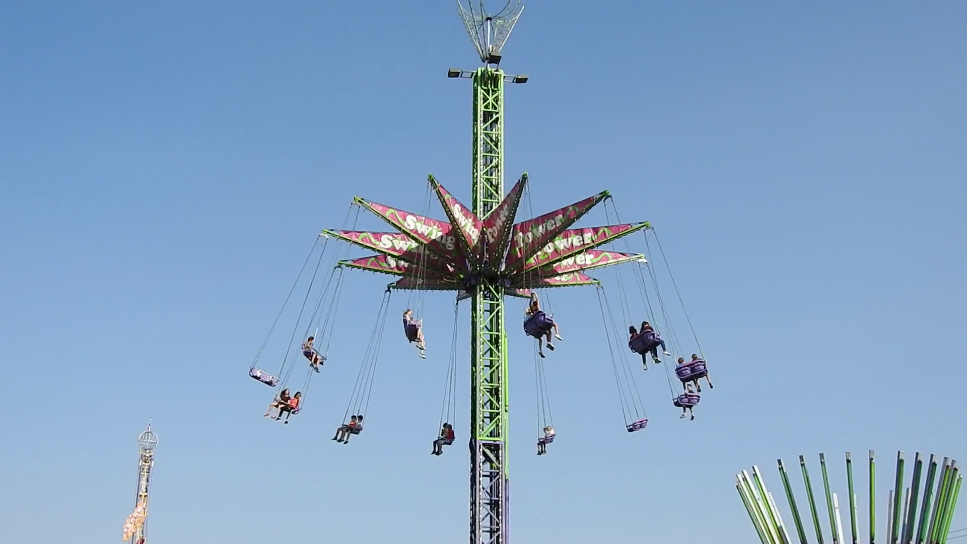 The Swing Tower Ride At Fair Amusement Park Stock Footage SBV-347747143 ...
