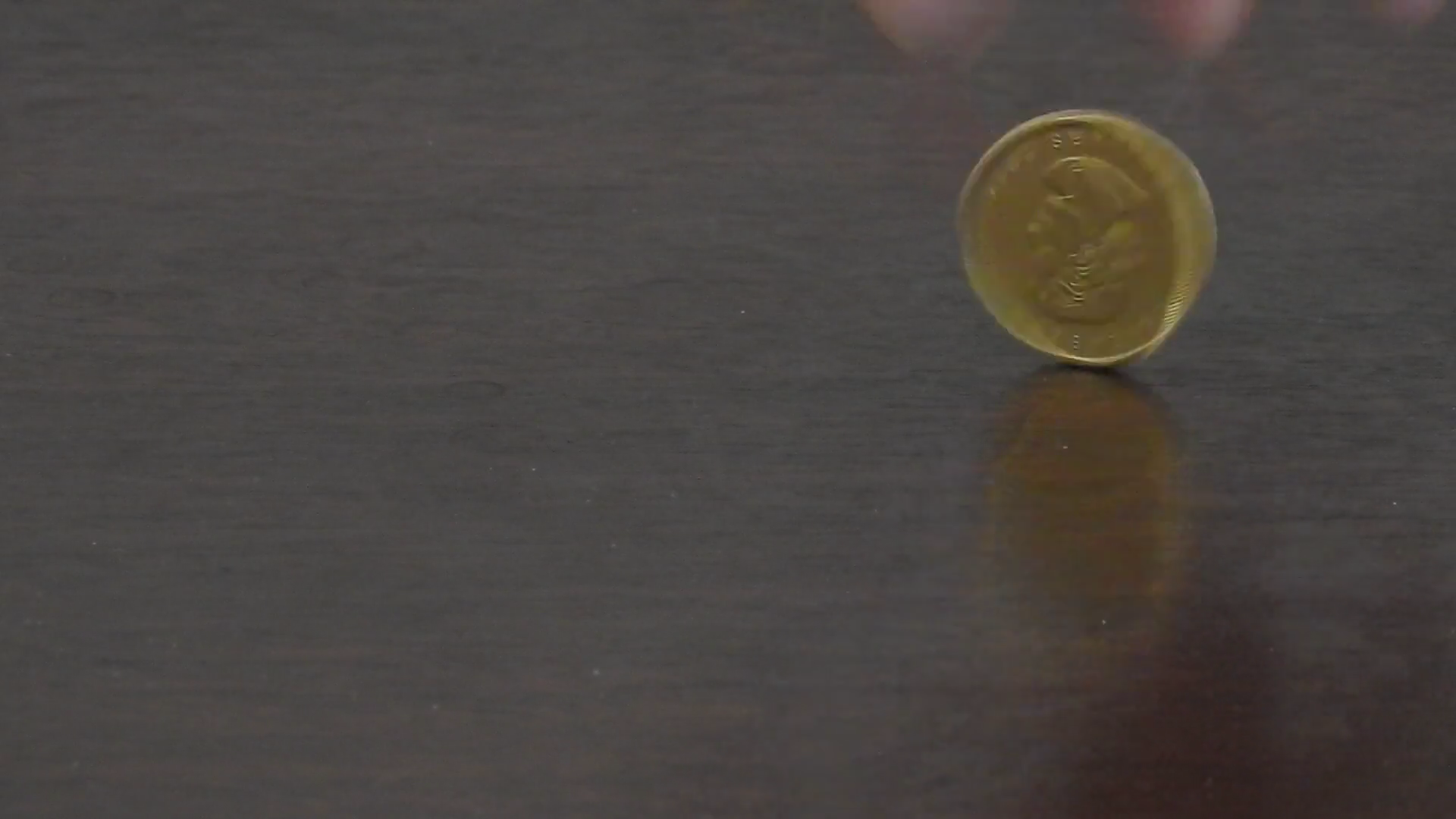 Gold Coin Currency Spinning On Wooden Surface Stock Footage SBV ...