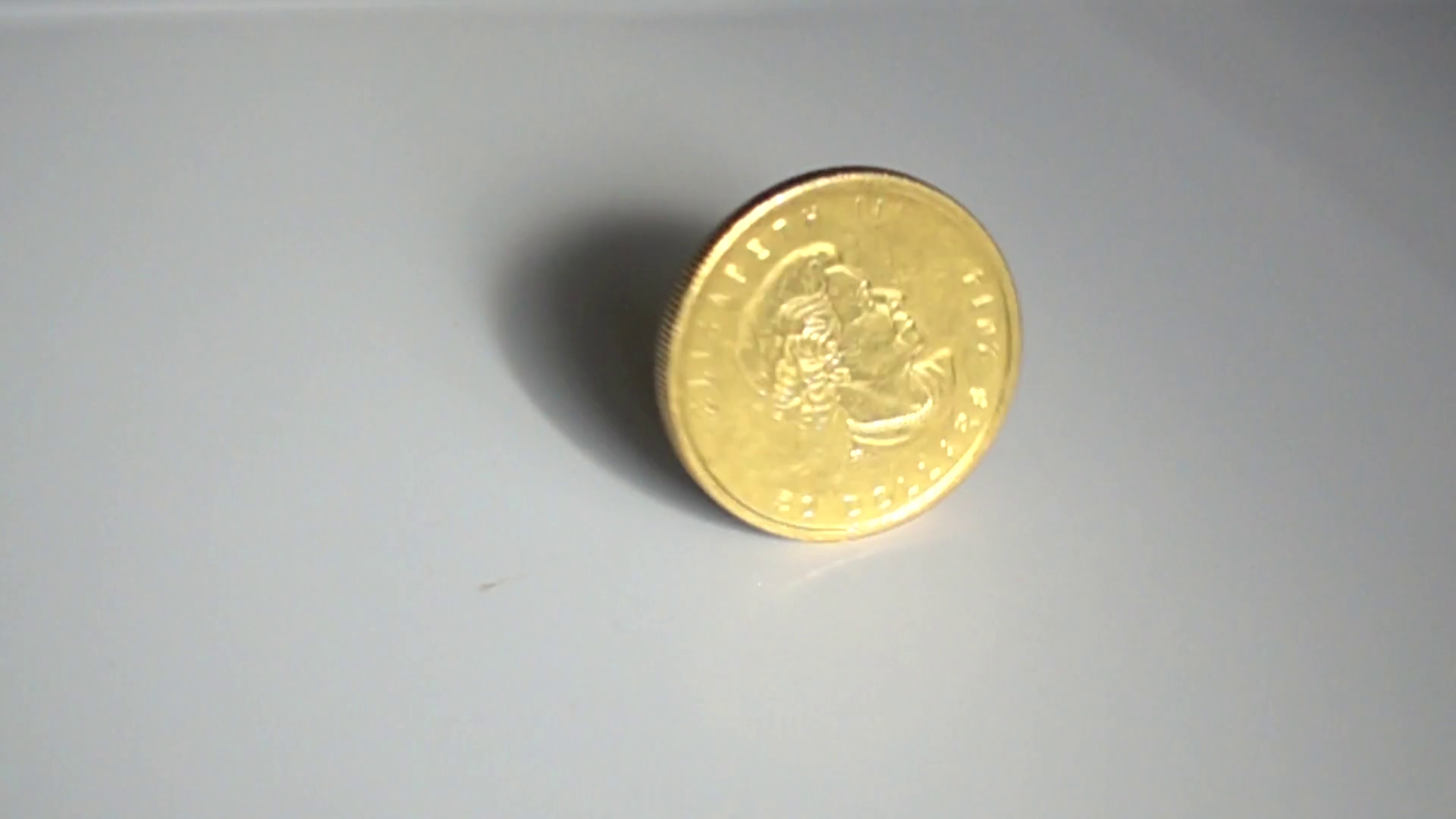 A Gold Coin Spins Off To Left In Slow Motion Stock Footage SBV ...