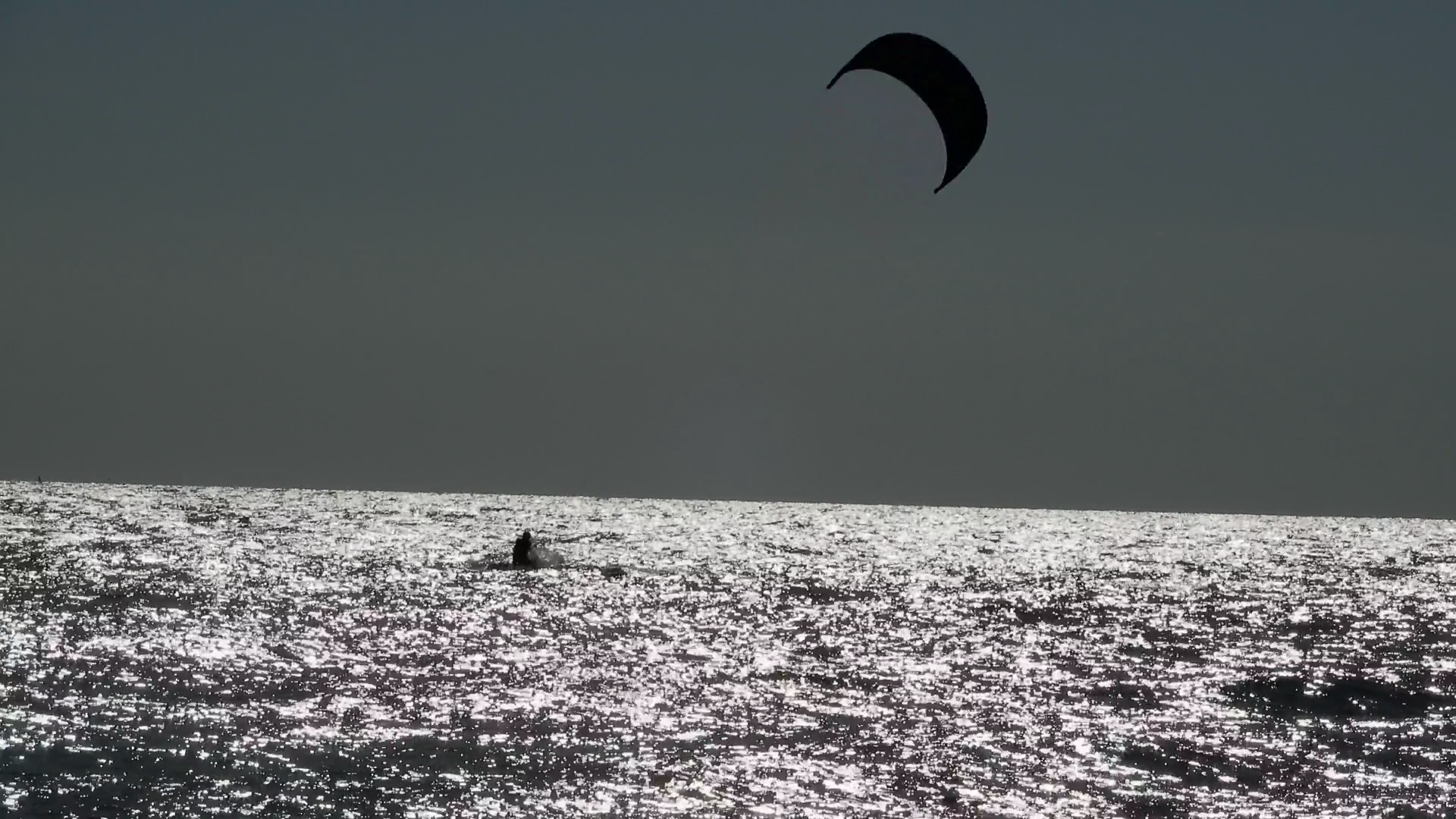 In Distance Kite Surfer Rides On Large Ocean Stock Footage SBV ...
