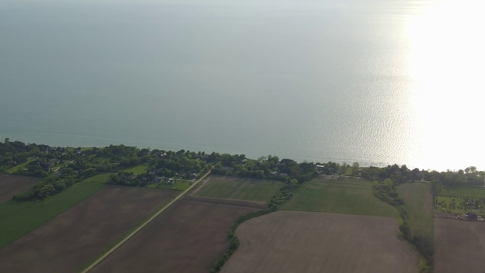 An Aerial Side View Captures Oceanfront Stock Footage SBV-347734266 ...