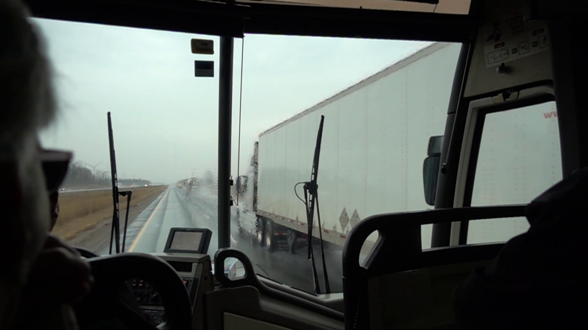 In Slow Motion Bus Drives Transport Truck On Stock Footage SBV ...