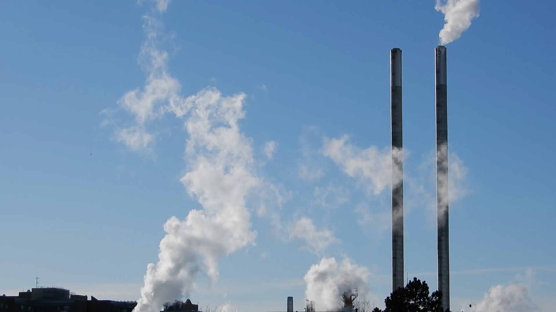 On Bright Sunny Day Tall Smoke Stacks Can Be Stock Footage SBV ...