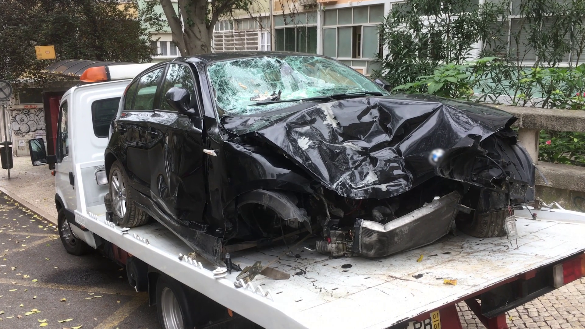 Zoom In Wrecked Car On Tow Truck Stock Footage SBV-352085946 - Storyblocks