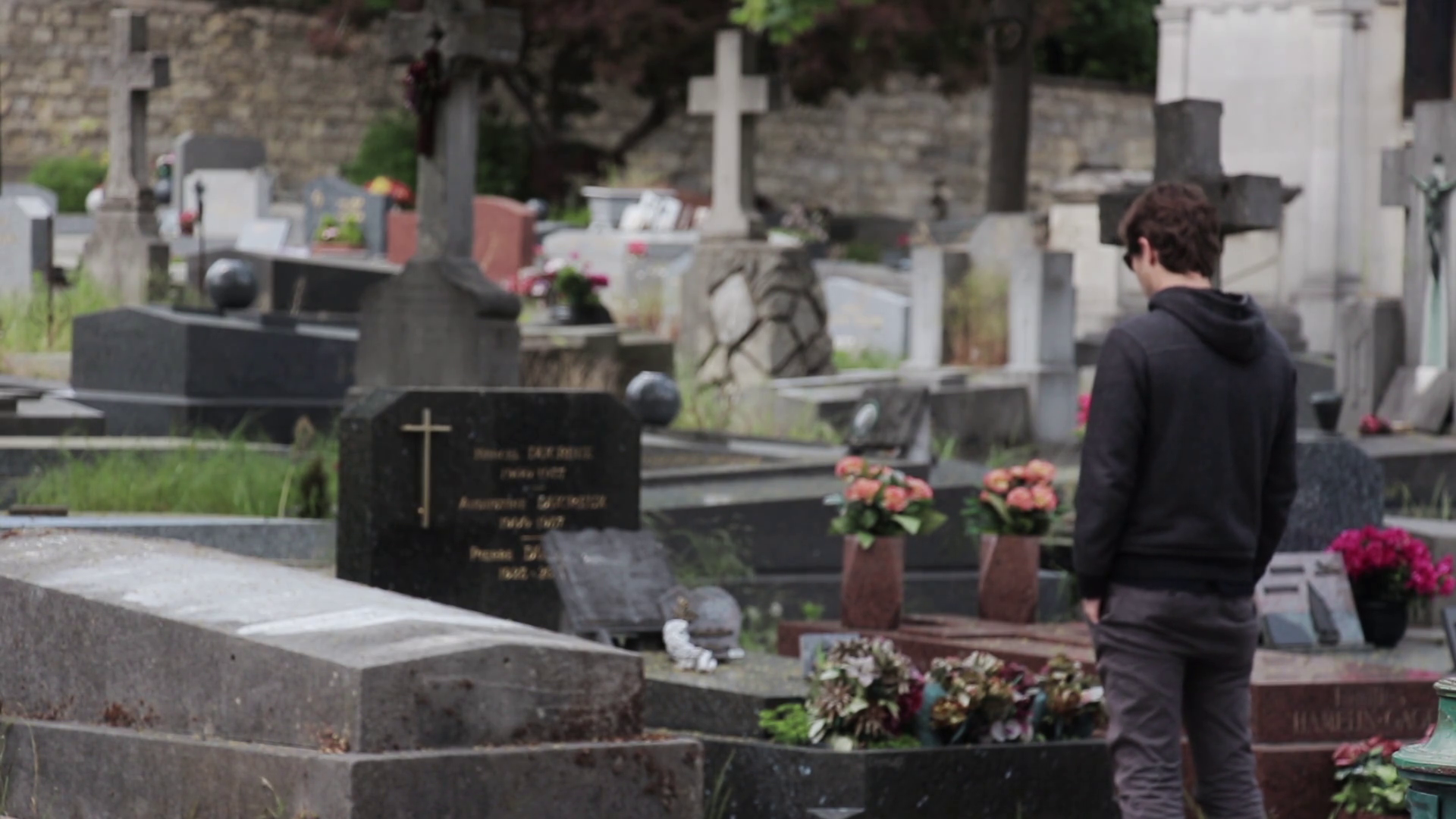 Young Man In Standing In Cemetery Tombstone Stock Footage SBV-352116568 ...