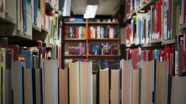 Library Book Shelf Stock Footage: Royalty-Free Video Clips - Storyblocks