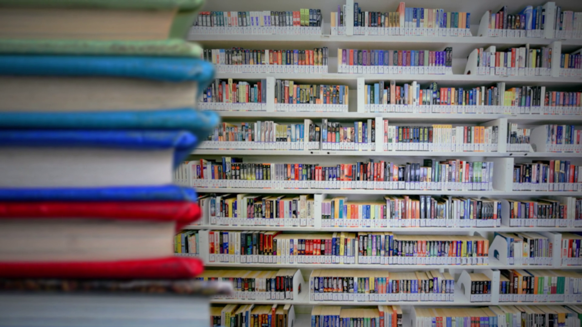 Library Stack Of Books Panning Shot Stock Footage SBV-352319032 ...