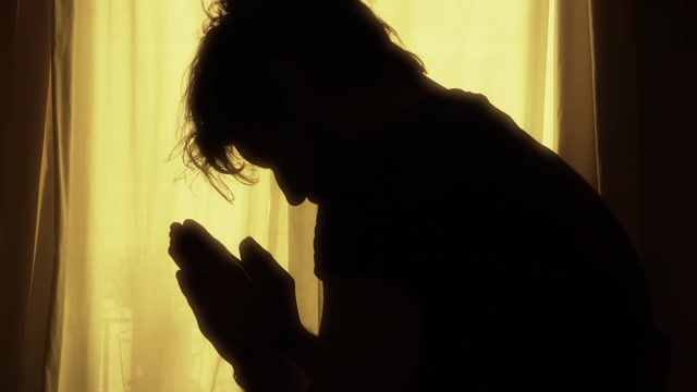 Crying Praying Stock Footage: Royalty-Free Video Clips - Storyblocks