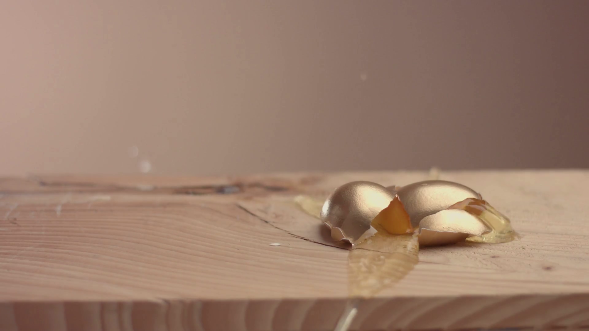 Slow Motion Golden Egg Falling Broken On Stock Footage SBV-321009899 ...