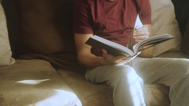 Man Reading Book Stock Footage: Royalty-Free Video Clips - Storyblocks